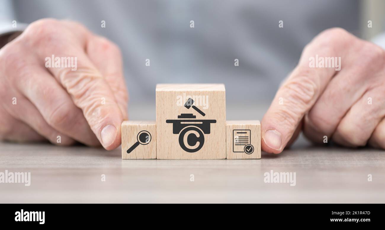 Wooden blocks with symbol of copyright concept Stock Photo - Alamy