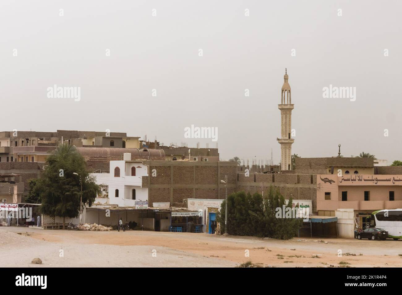 A rural gouses in the city of Esna with minaret under light sky Stock ...