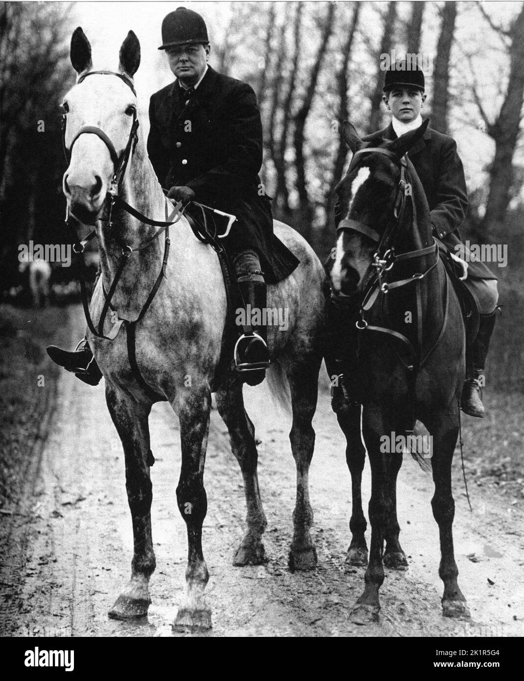 Winston Churchill with his son' Randolph, riding with the boar hounds ...