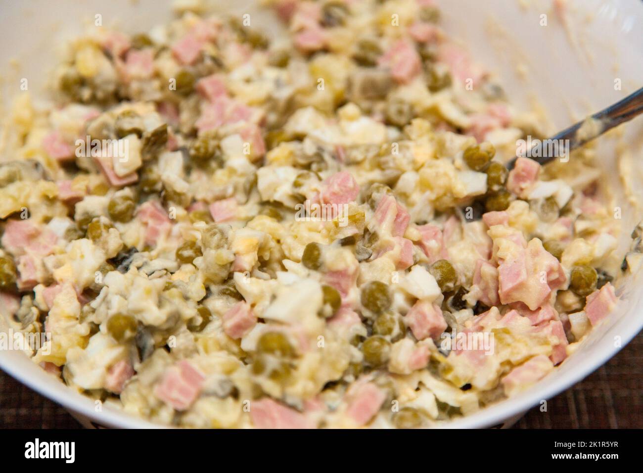 Russian salad Olivier close-up. A traditional Russian dish on the New ...