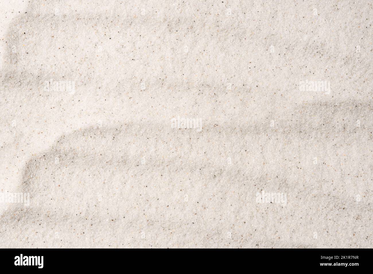 Natural background of white sand Stock Photo - Alamy