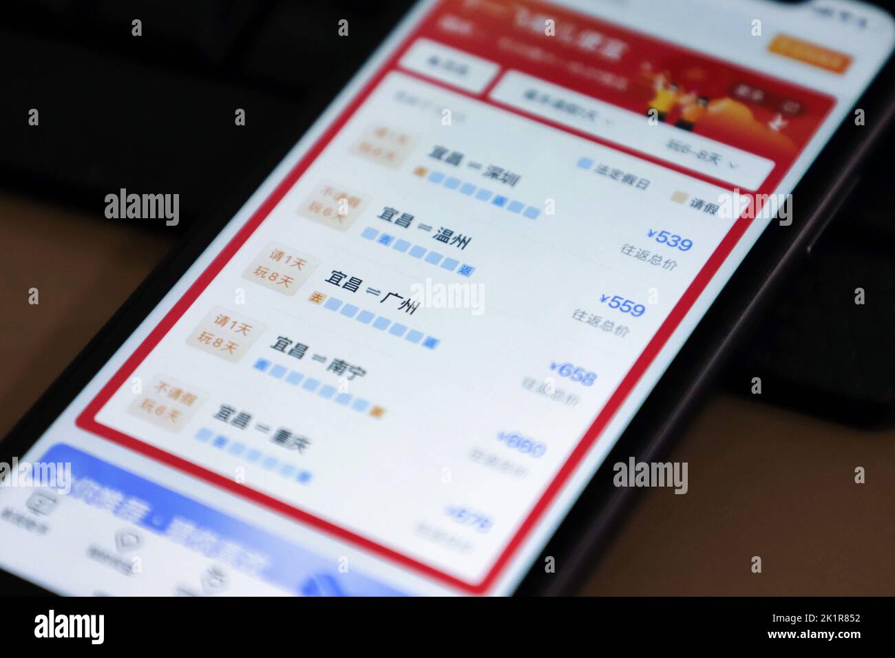 YICHANG, CHINA - SEPTEMBER 20, 2022 - A mobile phone displays a travel ...