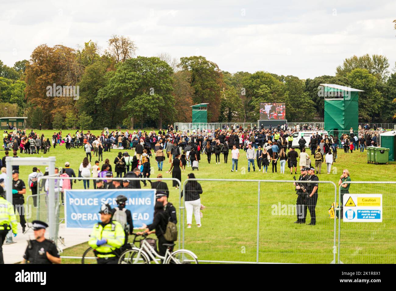 A crowd of people outside Windsor Castle watching the Royal Guards ...