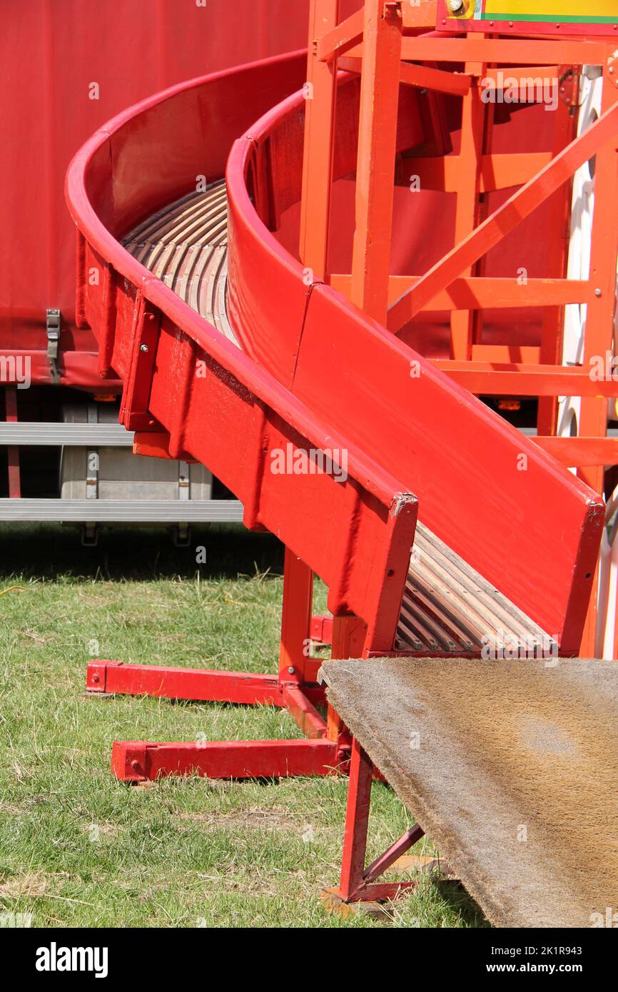 The Bottom of a Traditional Fun Fair Wooden Slide Stock Photo - Alamy