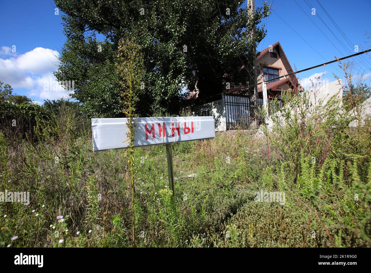 IZIUM, UKRAINE - SEPTEMBER 19, 2022 - The 'Mines' sign is pictured near ...