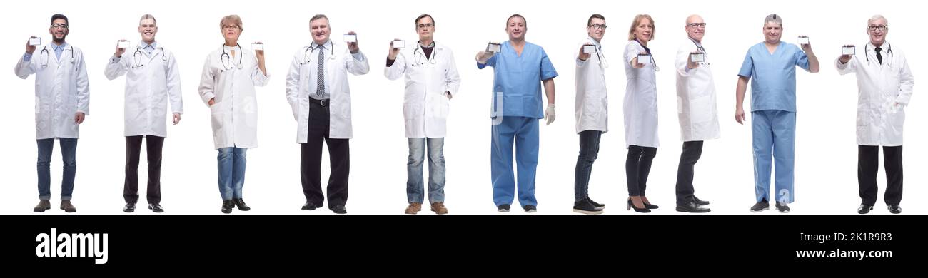 full length group of doctors showing badge isolated Stock Photo - Alamy
