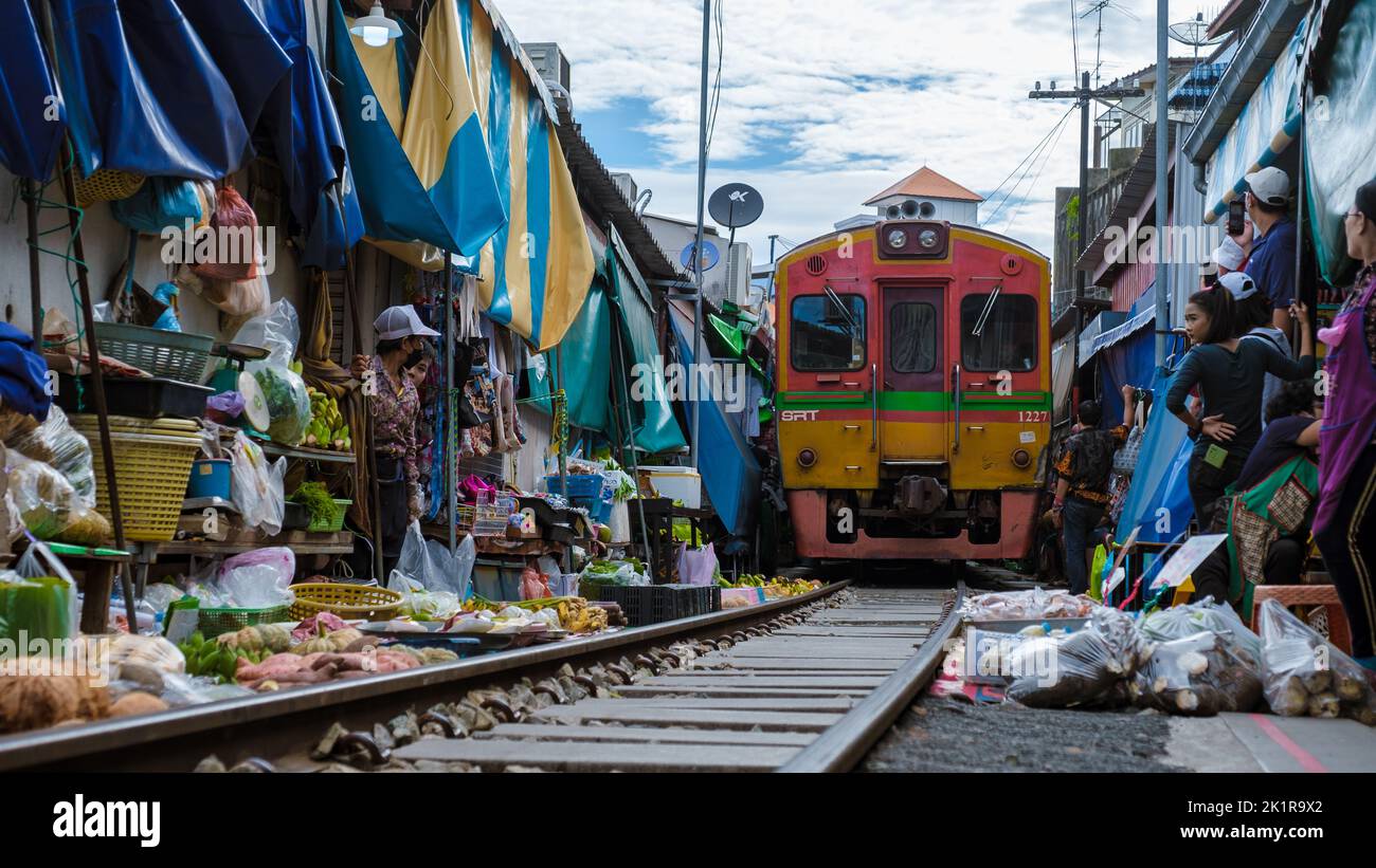 Maeklong Railway Market Thailand, . Train on Tracks Moving Slow ...