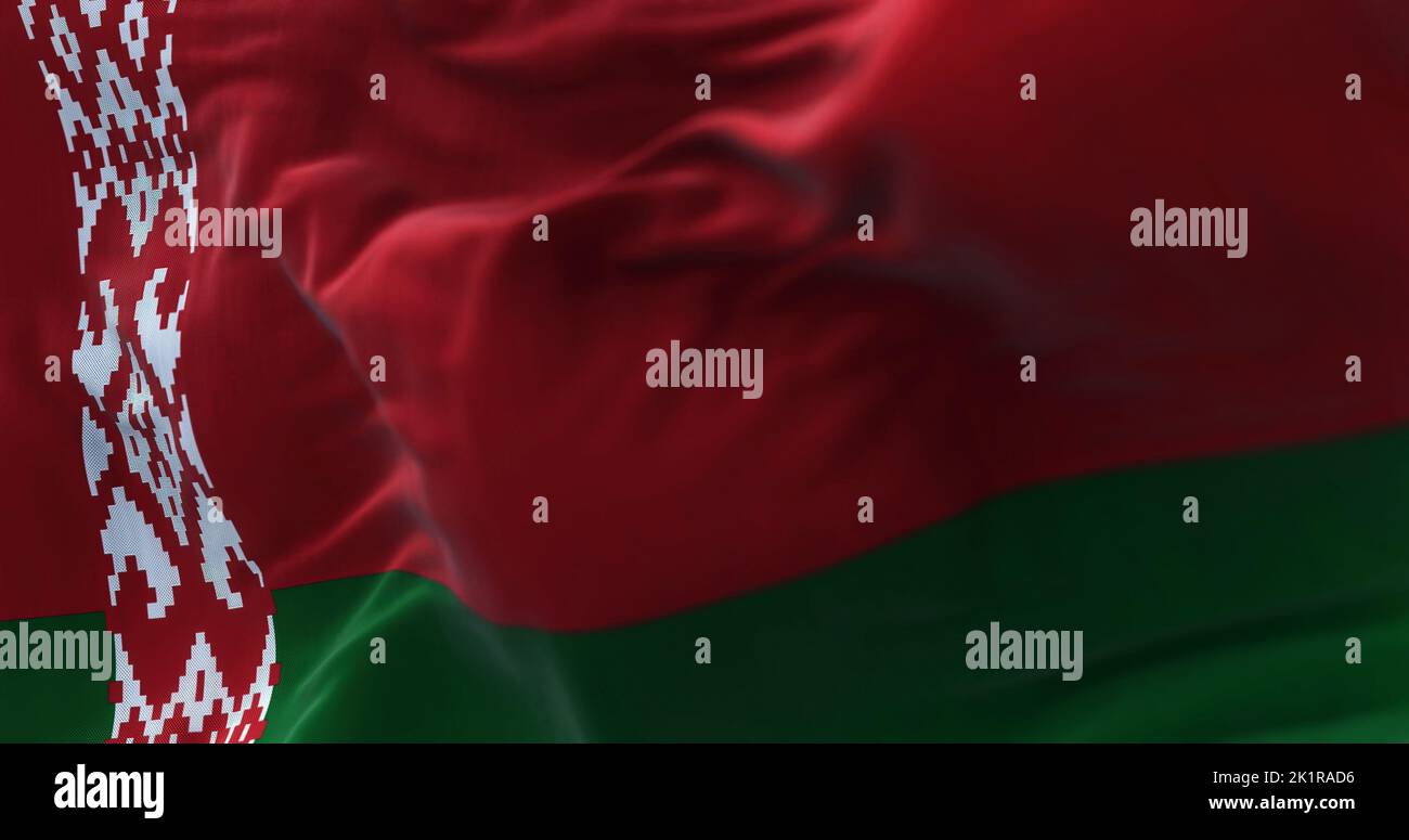 Close-up view of the belarusian national flag waving in the wind. The ...
