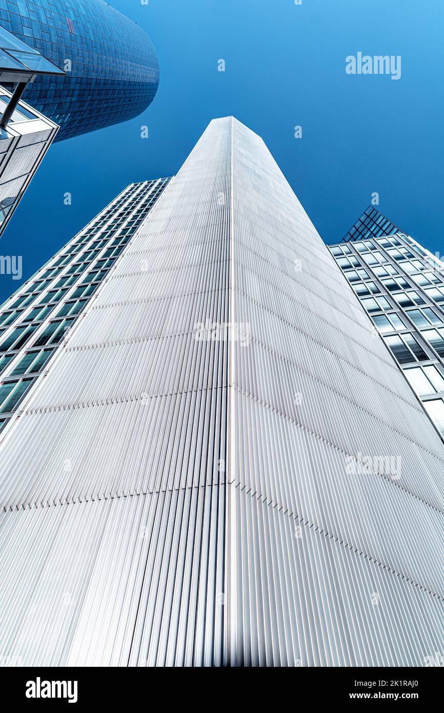 A vertical low angle shot of tall skyscrapers in the downtown Stock ...