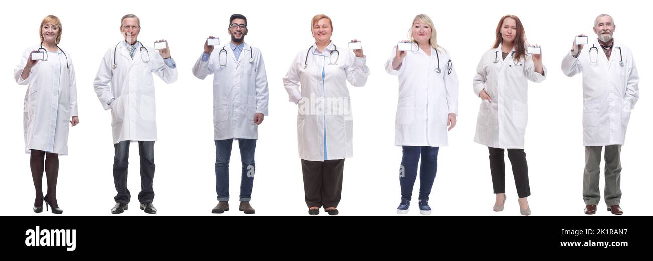 full length group of doctors showing badge isolated Stock Photo - Alamy