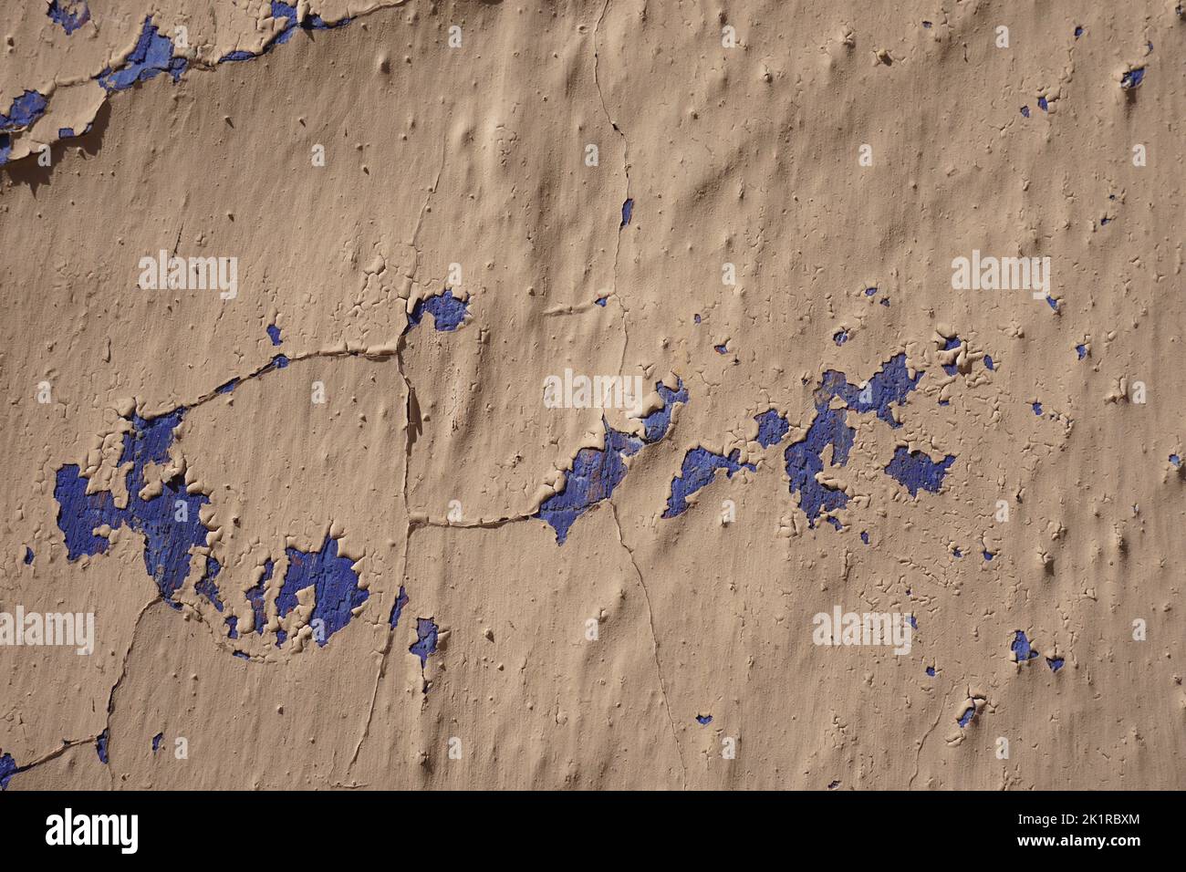 cracked plaster wall detail showing layers of blue underneath Stock ...