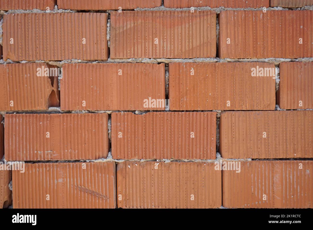 wall consisting of unpainted bricks Stock Photo - Alamy