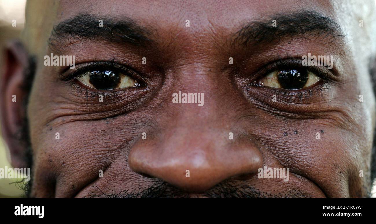 Macro eyes happy man looking hi-res stock photography and images - Alamy