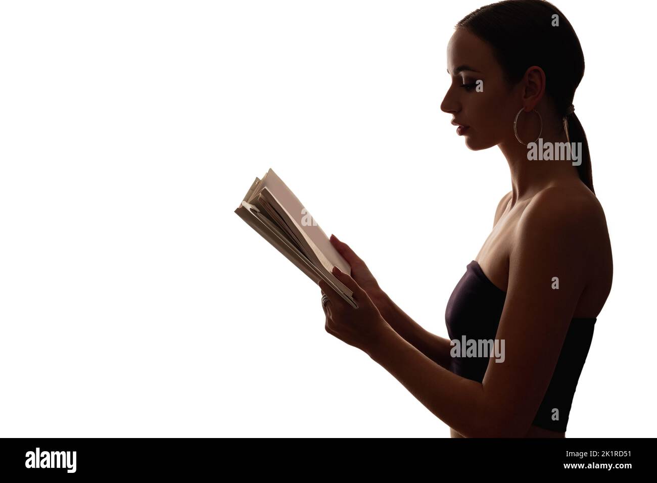 Smart woman silhouette. Reading hobby. Leisure relaxation. Dark ...