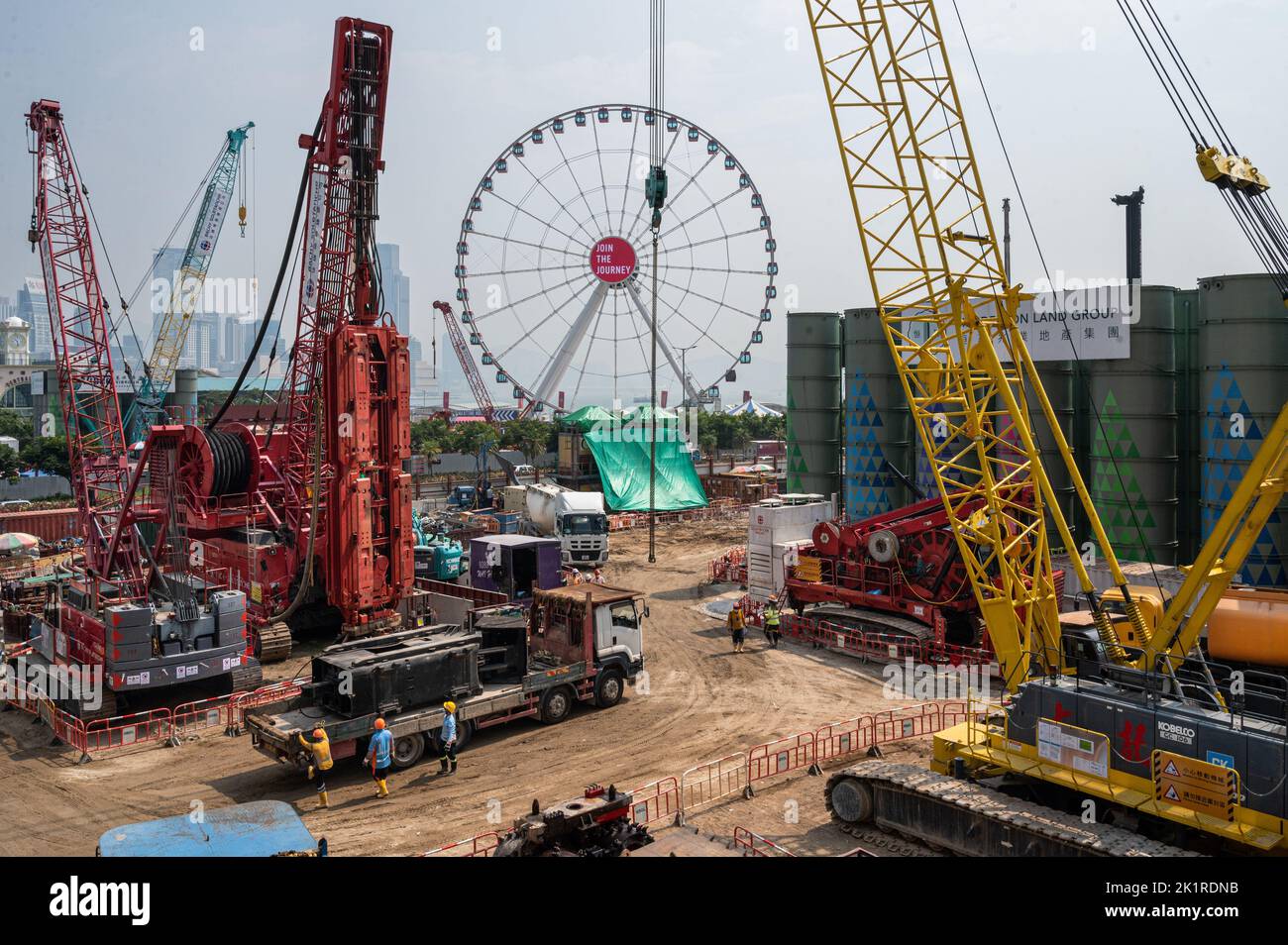 Hong Kong, China. 16th Sep, 2022. Engineering workers and cranes work ...