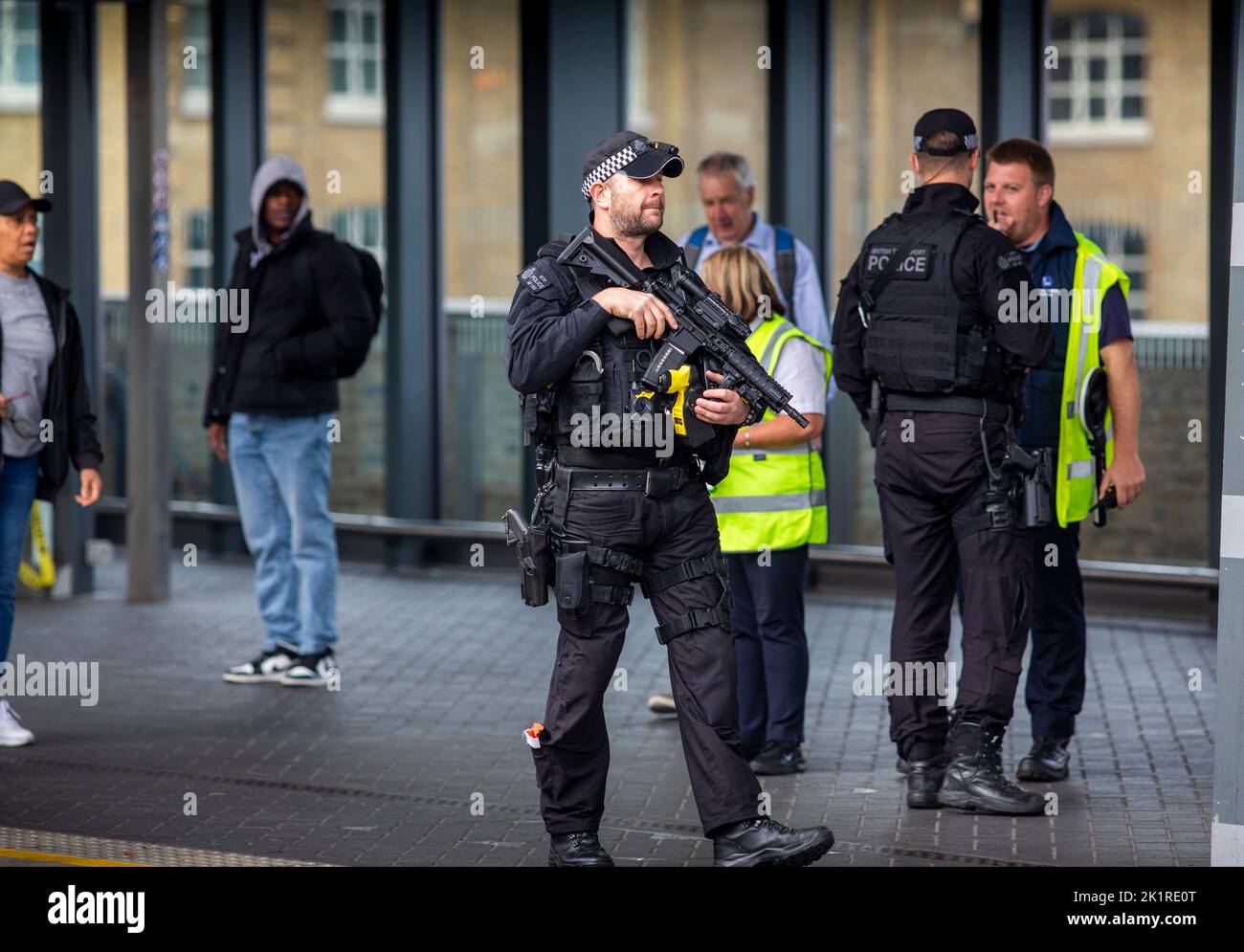 Armed police officers patrol a platform at London Bridge mainline ...