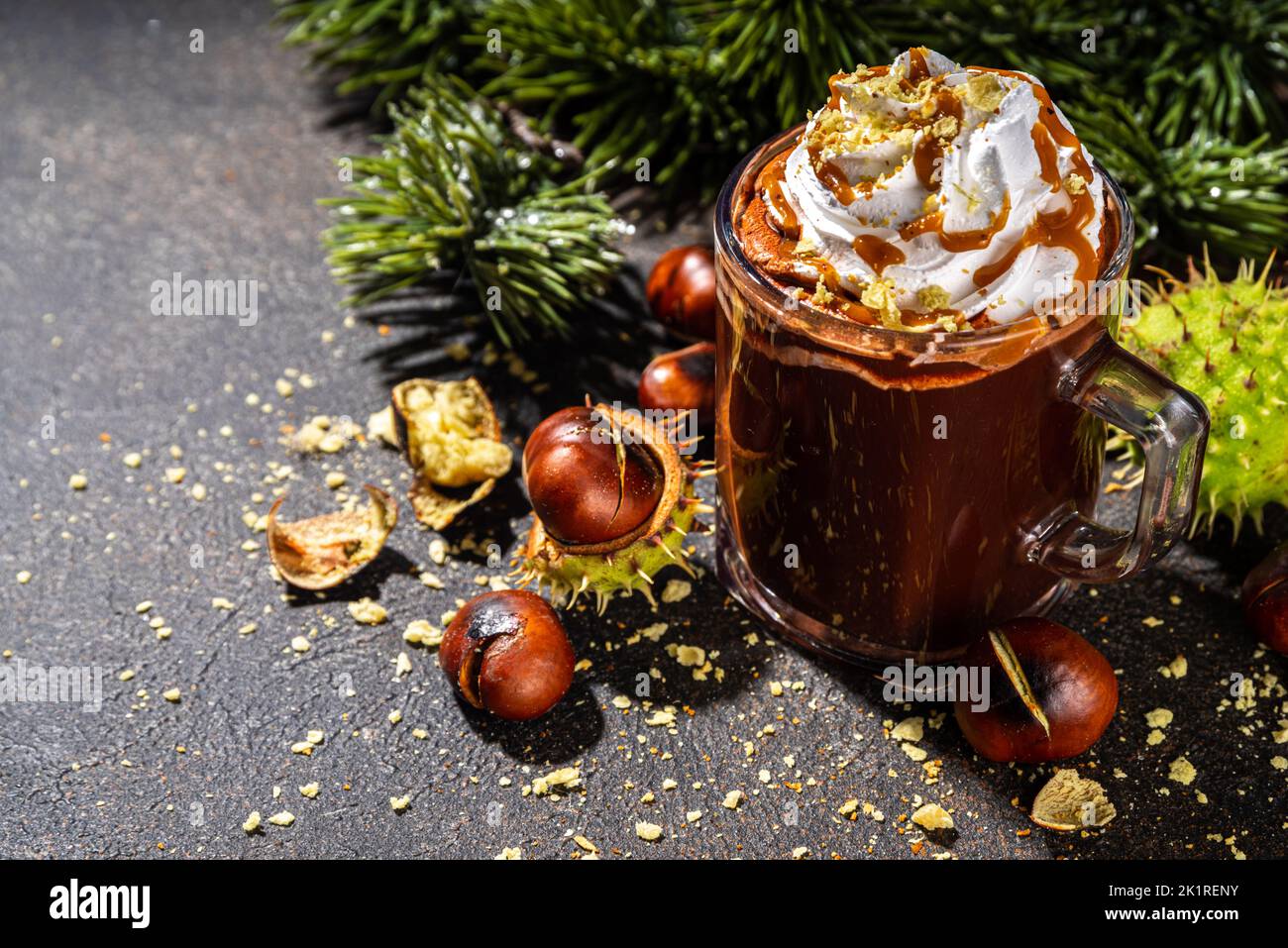 Glass cup with dark chestnut hot chocolate or choco latte, with whipped ...