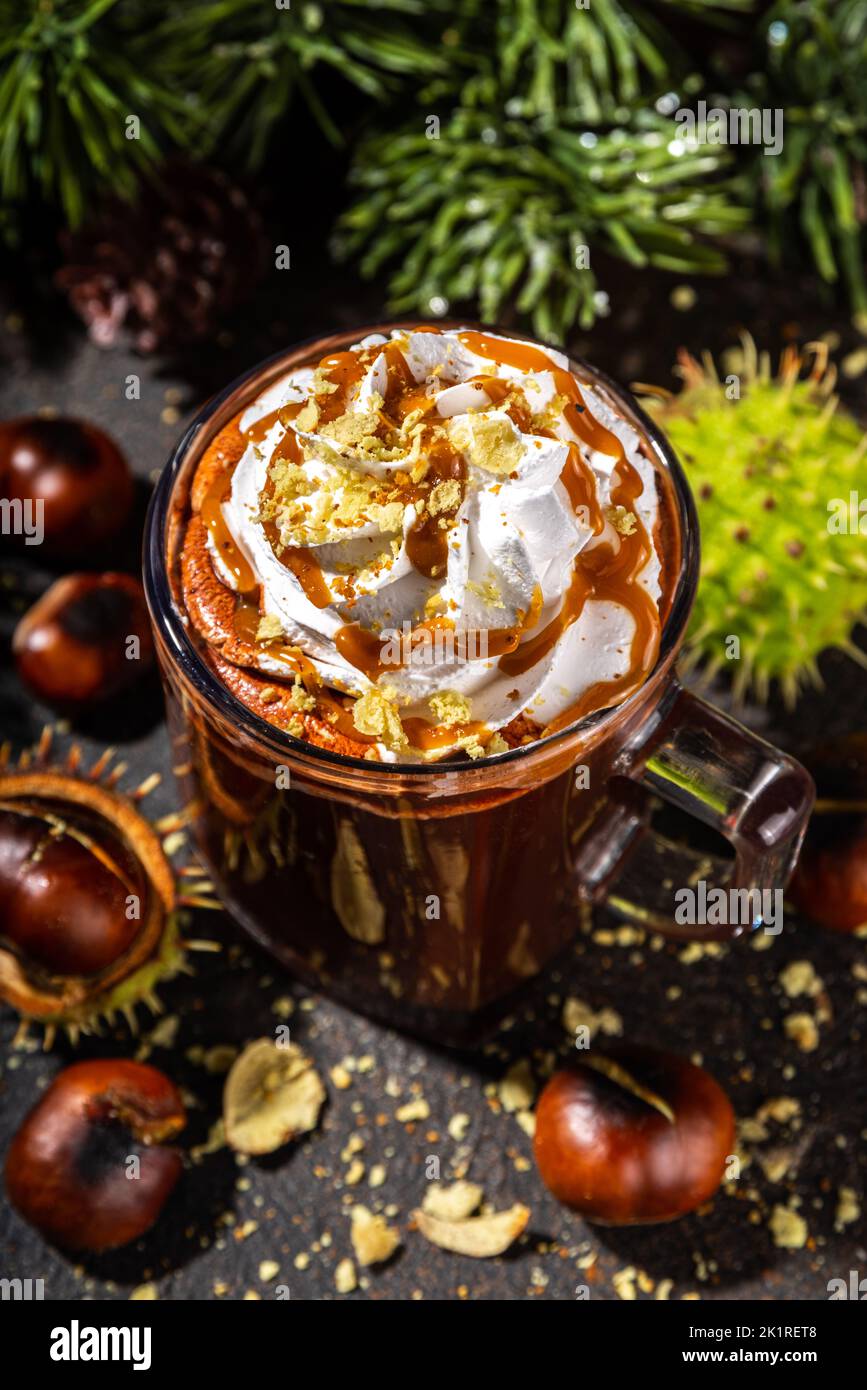 Glass cup with dark chestnut hot chocolate or choco latte, with whipped ...