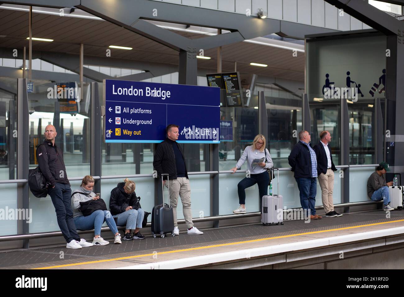 People travel through London Bridge train station on their way to show ...