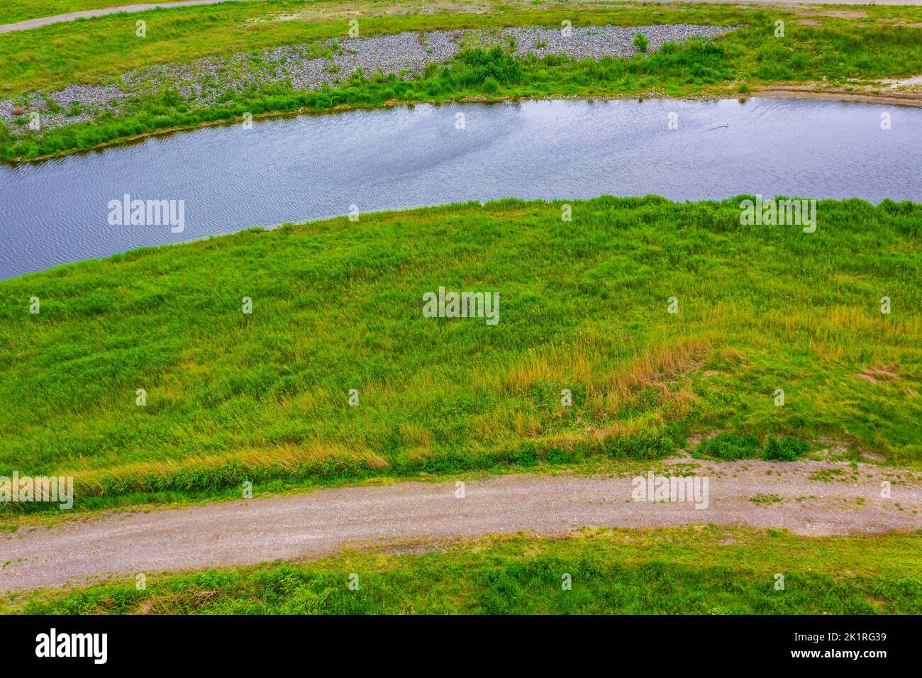 North German agricultural field forest river water dyke dike and nature ...