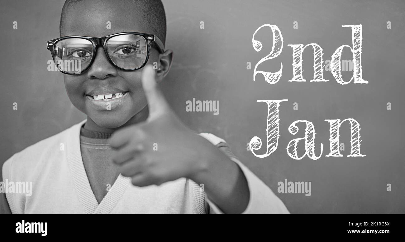 Composite of 2nd jan text and portrait of african american boy showing ...