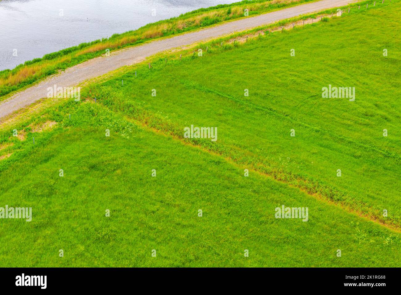 North German agricultural field forest river water dyke dike and nature ...