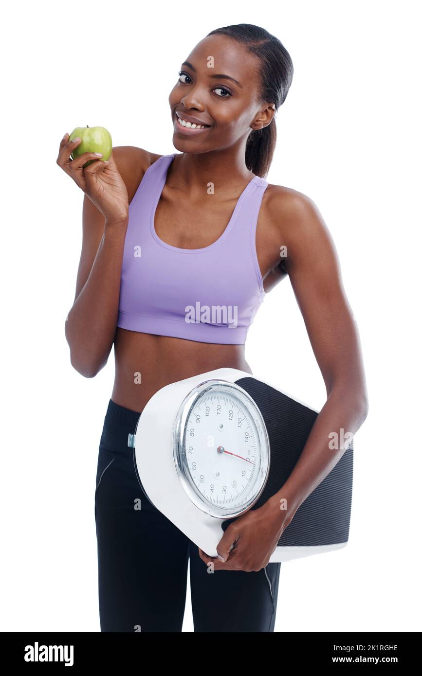 Healthy choices make healthy bodies. An isolated portrait of a sporty ...