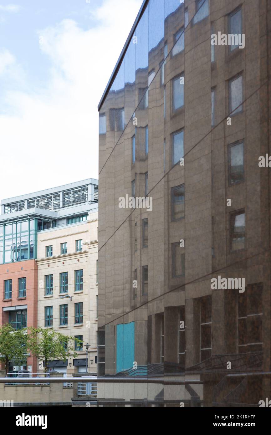Office buildings in Conference Square reflected on exterior walls of ...
