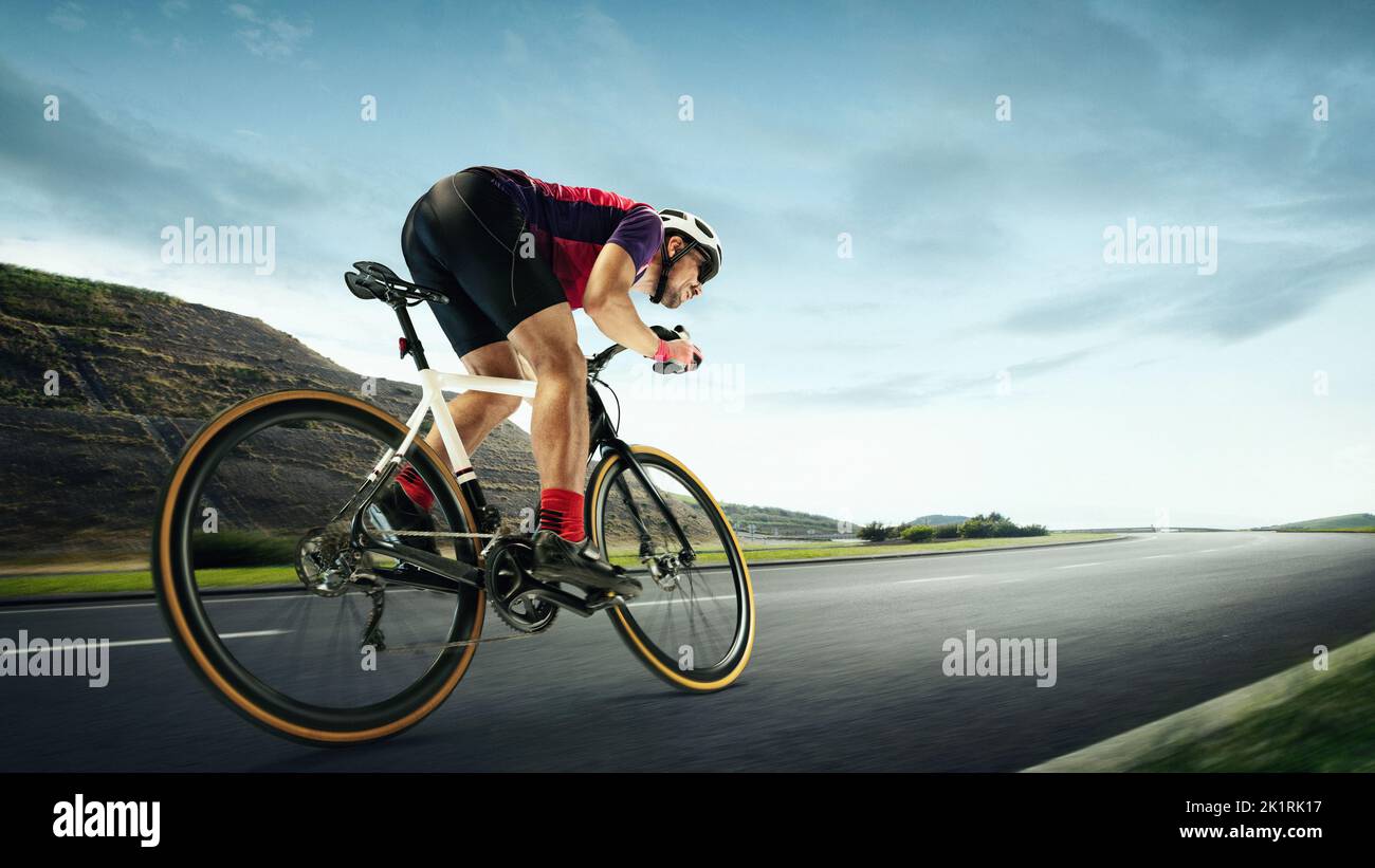 Back view. Portrait of man, professional cyclist training, riding on ...
