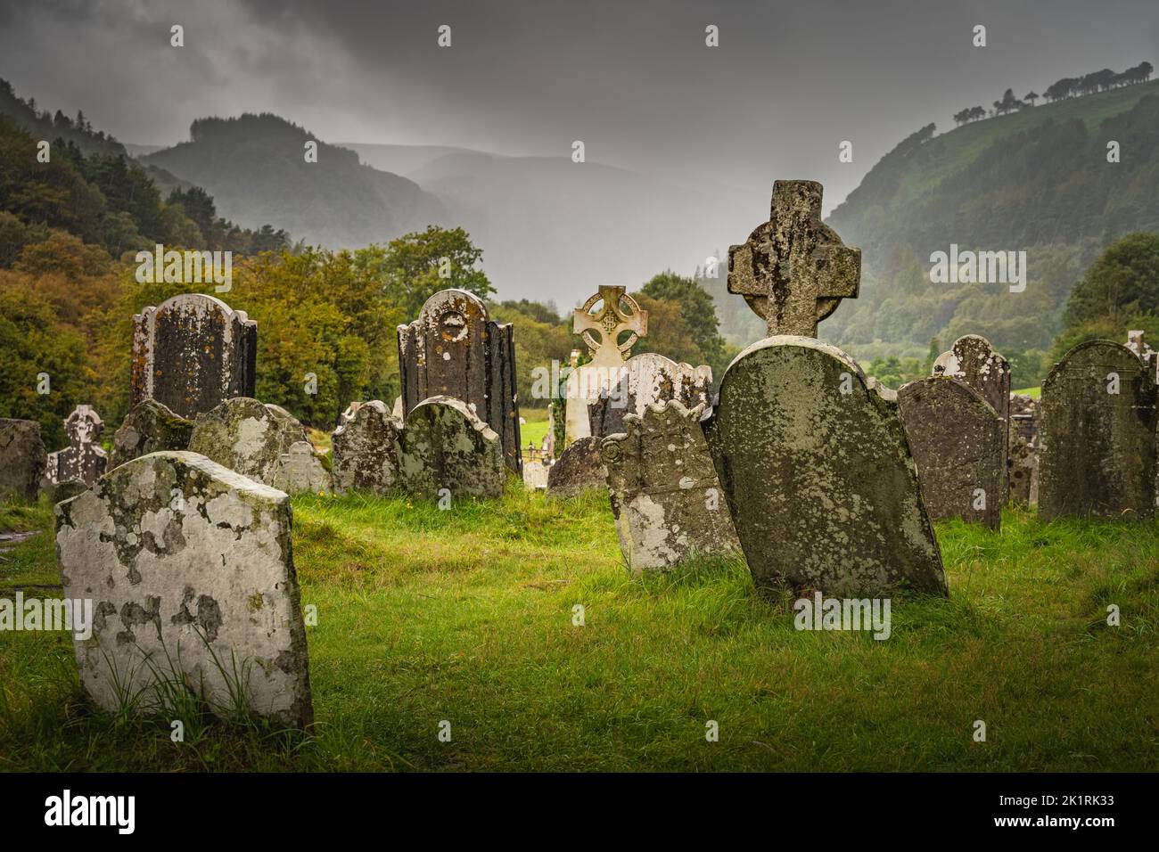 Ancient graves with Celtic crosses in Glendalough Cemetery. Autumn ...