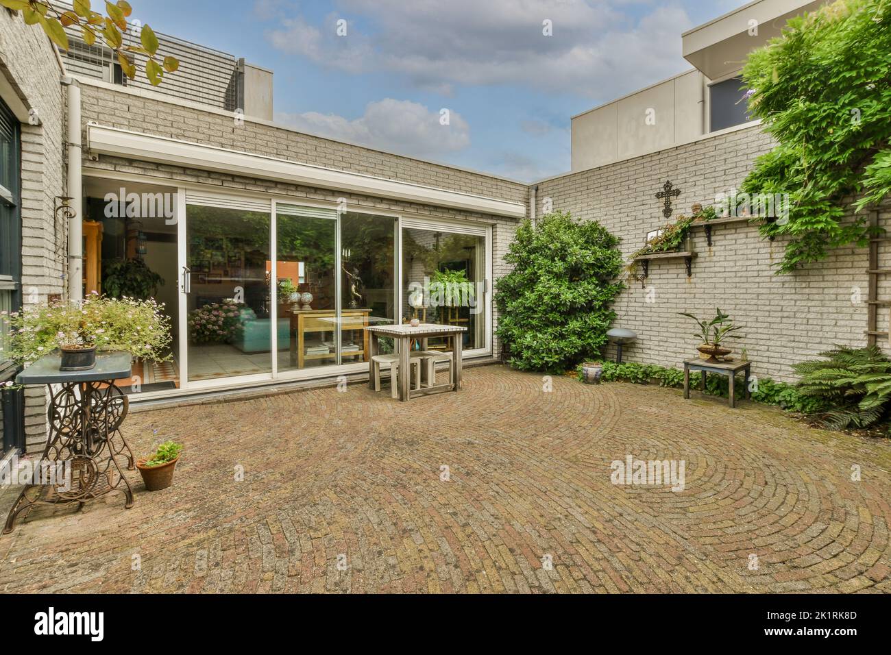 Simple small patio with small garden Stock Photo - Alamy