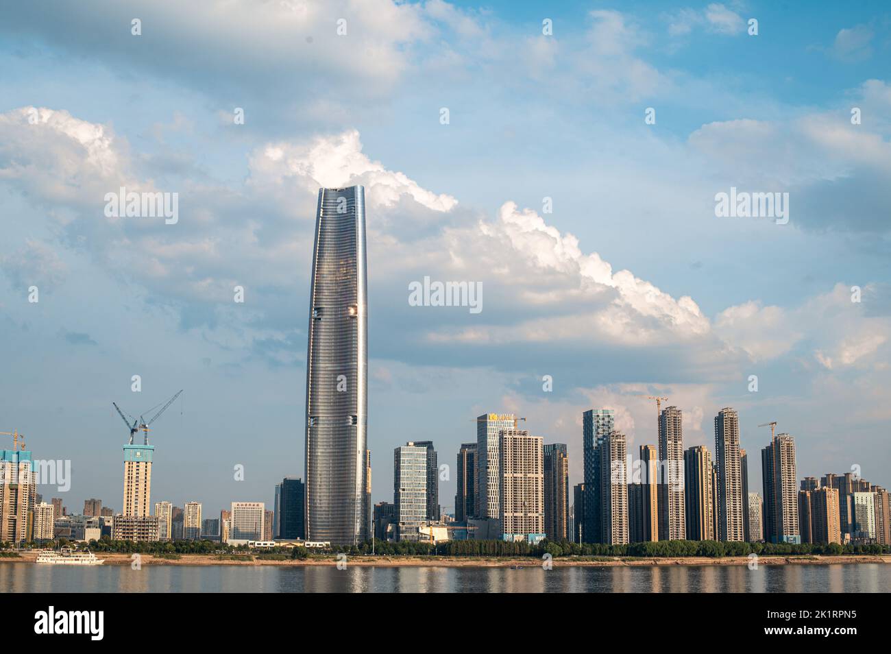 The modern Wuhan Greenland Center at the waterfront Stock Photo - Alamy
