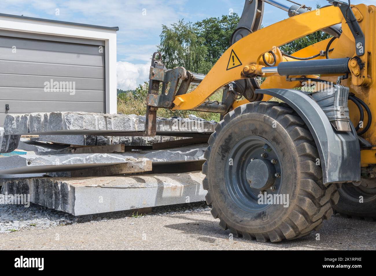 Transport Natural Stone Granite On Construction Site With Wheel Loader ...