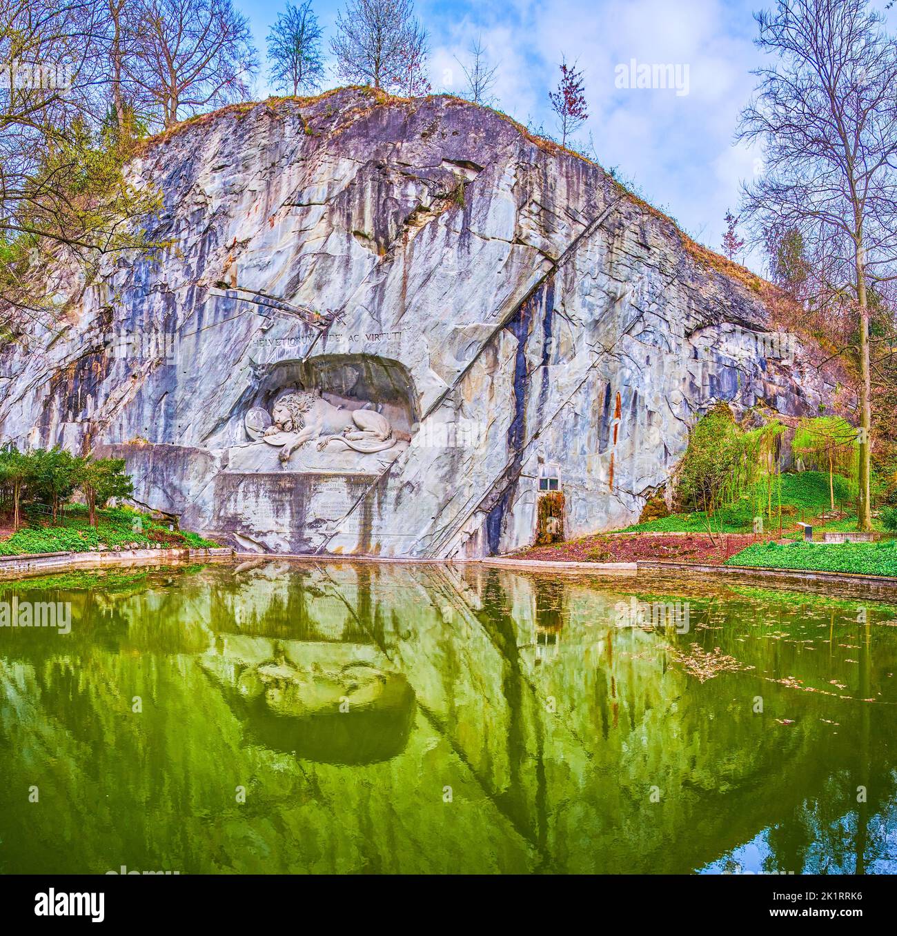 Lion Monument also famous as the Lion of Lucerne, carved in the rocky ...