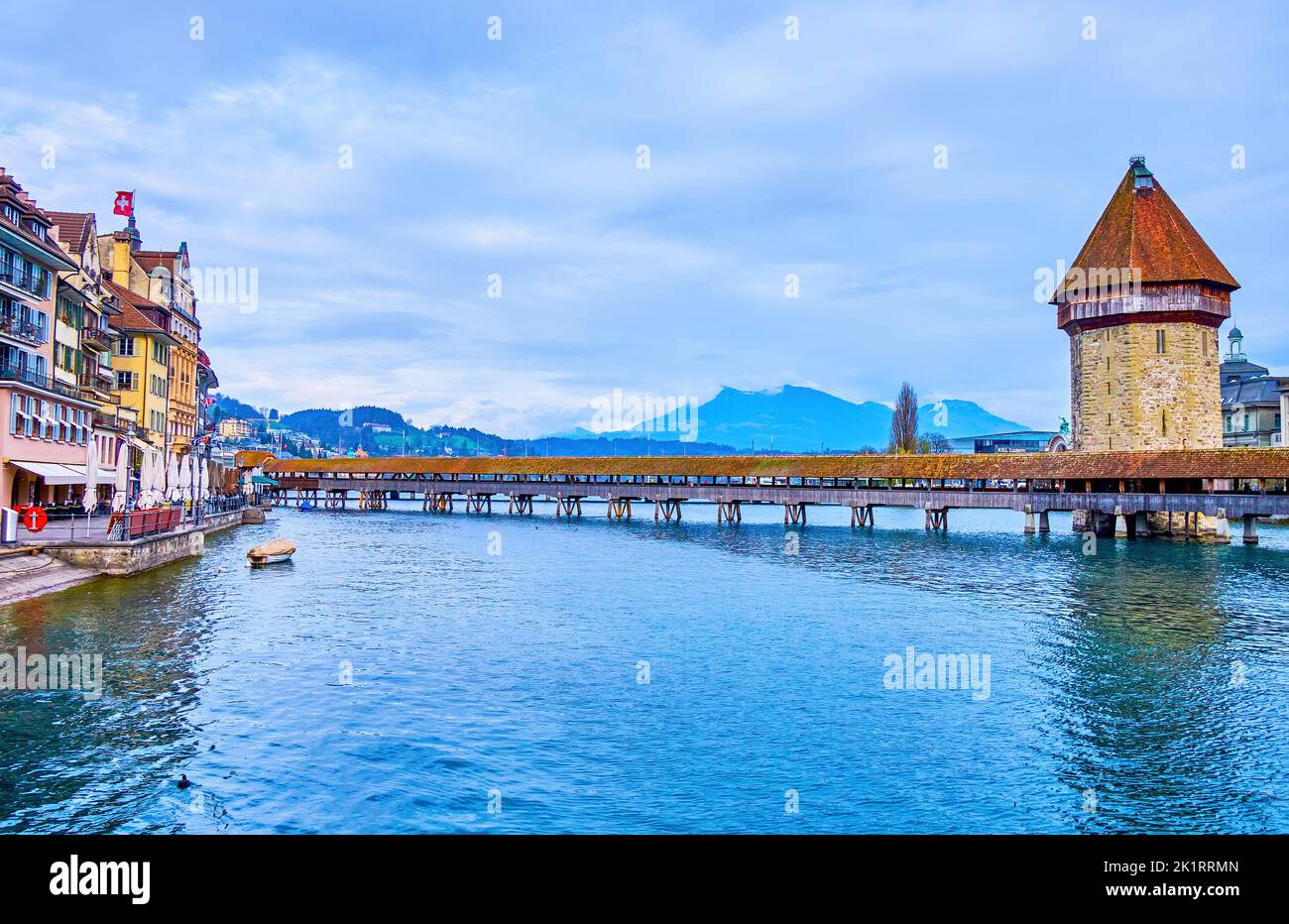 Medieval landmarks, such as Kapellbrucke bridge Wasserturm tower on ...