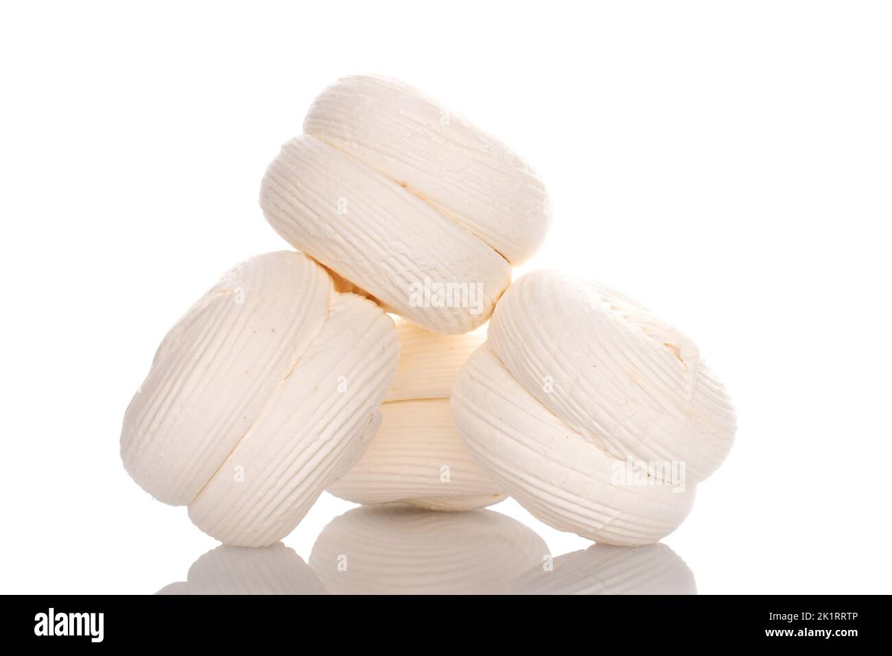 Four sweet white marshmallows, macro, isolated on white background ...