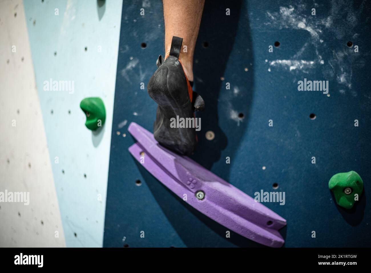 Close-up of a climbing shoe standing up to reach a new hold on the climbing wall Stock Photo - Alamy