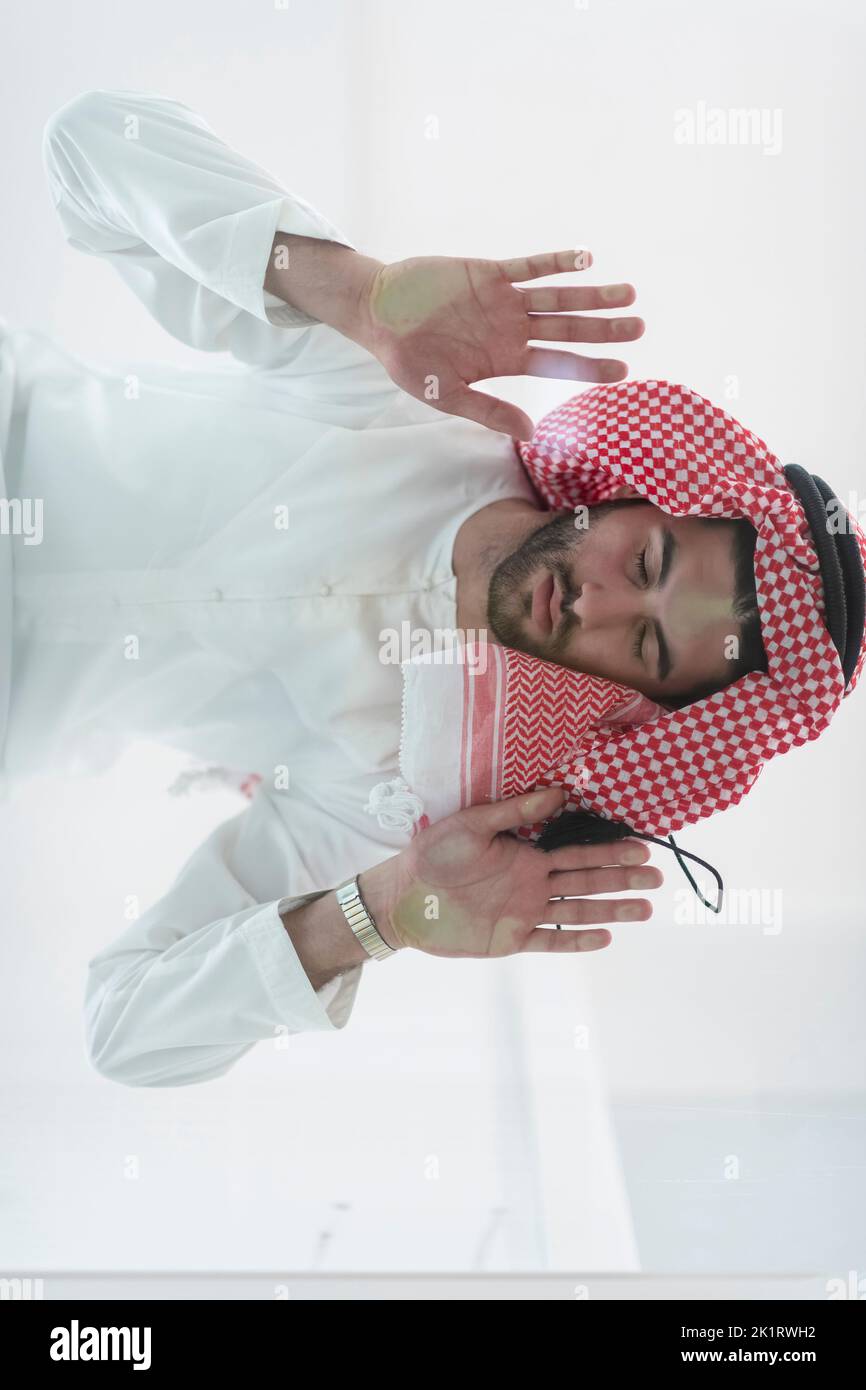 Muslim man doing sujud or sajdah on the glass floor Stock Photo - Alamy