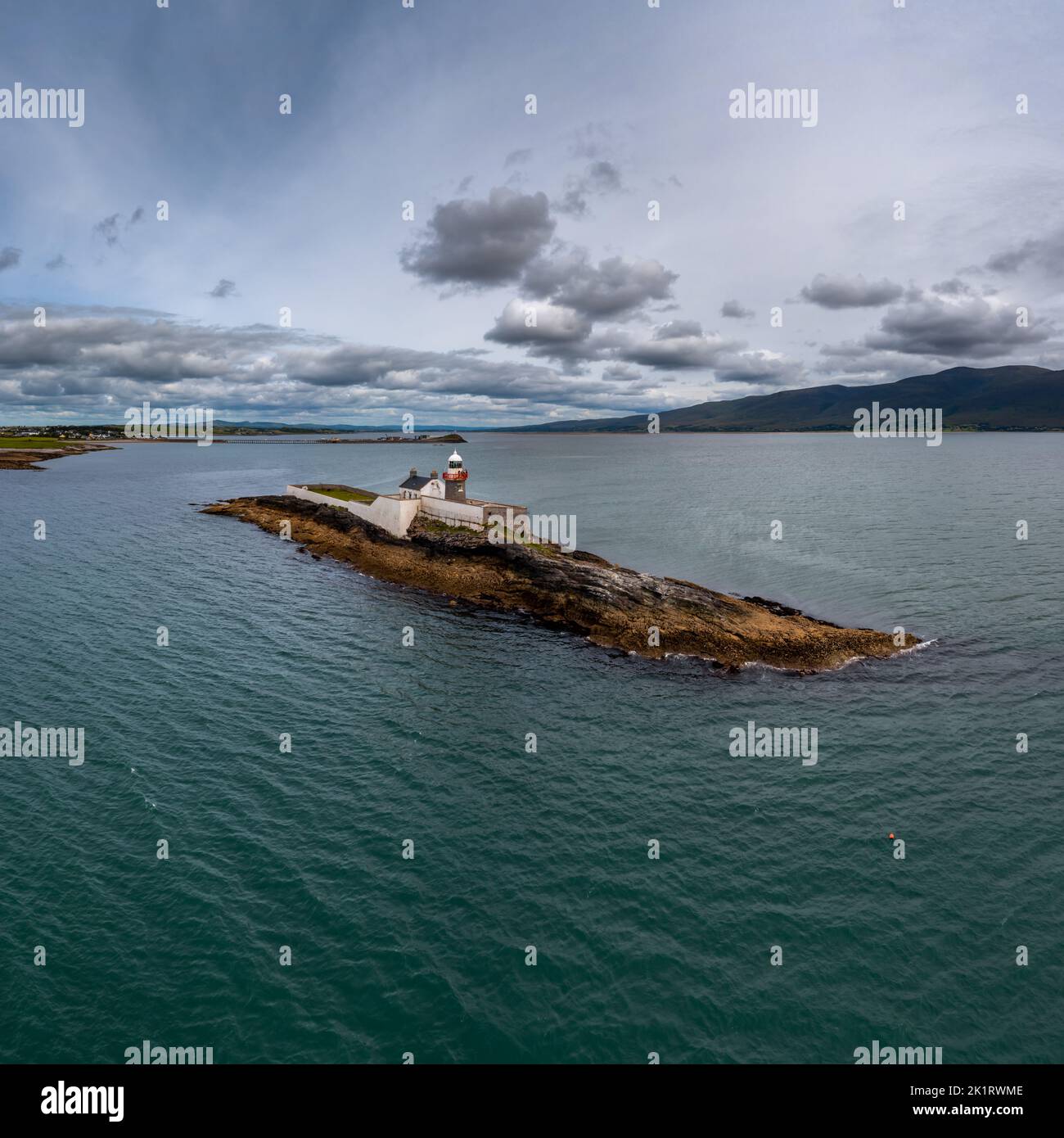 Aerial view of the historic Fenit Lighthouse on Little Samphire Island ...