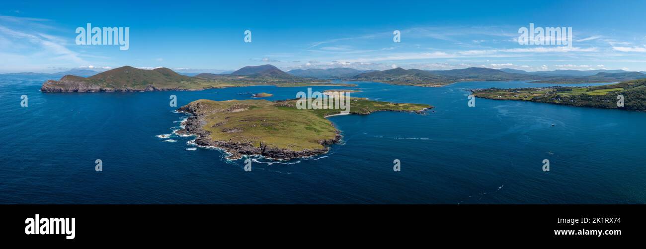 An aerial panorama of the coastal landscape of the Iveragh Peninsula ...