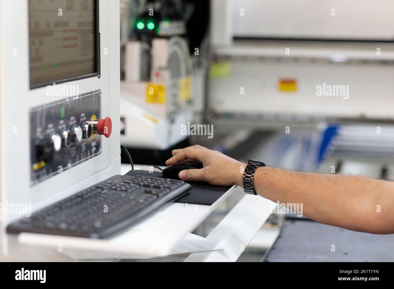 Male hand controls cnc machine hi-res stock photography and images - Alamy
