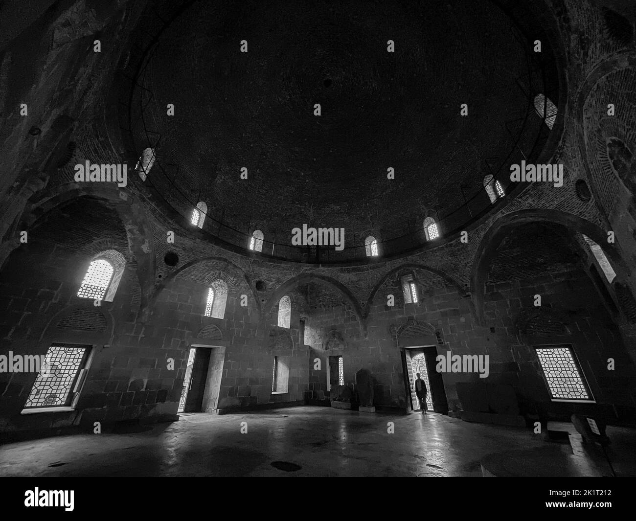 woman walking inside old stone castle Stock Photo - Alamy