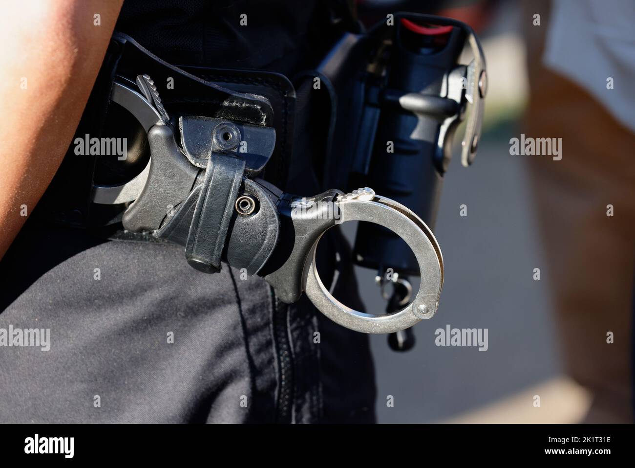 Law & Order, Police, Close up of officers belt showing handcuffs Stock ...