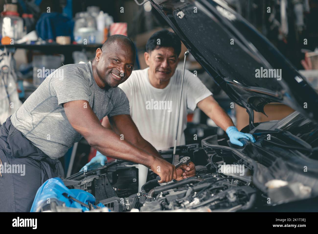 happy auto mechanics service team staff worker enjoy working together ...