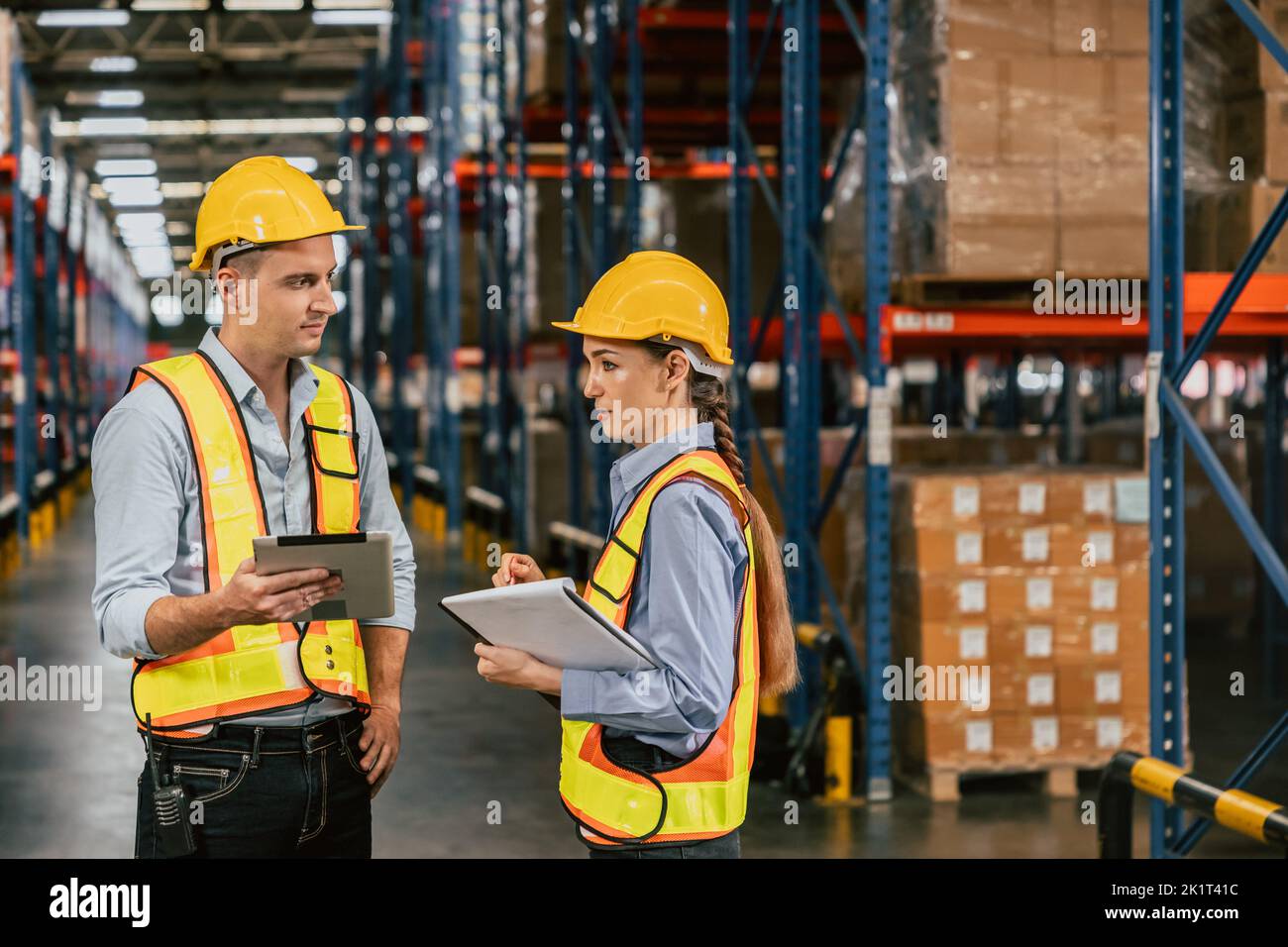 cargo warehouse professional working people caucasian male and woman ...