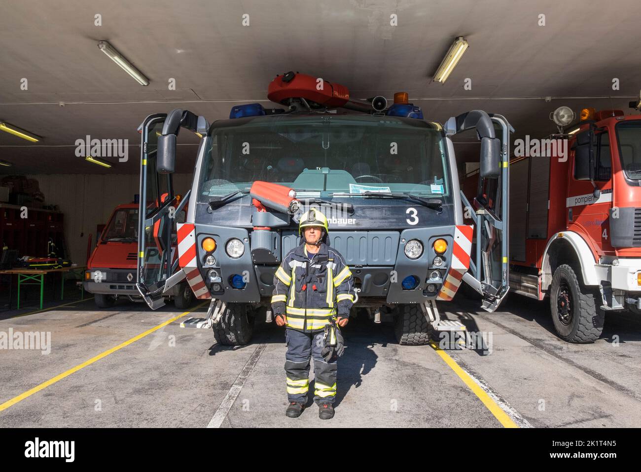 Switzerland, Agno-Lugano Airport, Fire station, Firefighter in ...
