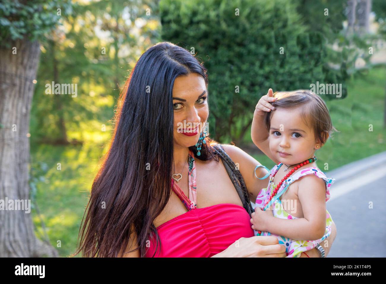 Mother daughter walking in sunny hi-res stock photography and images - Alamy