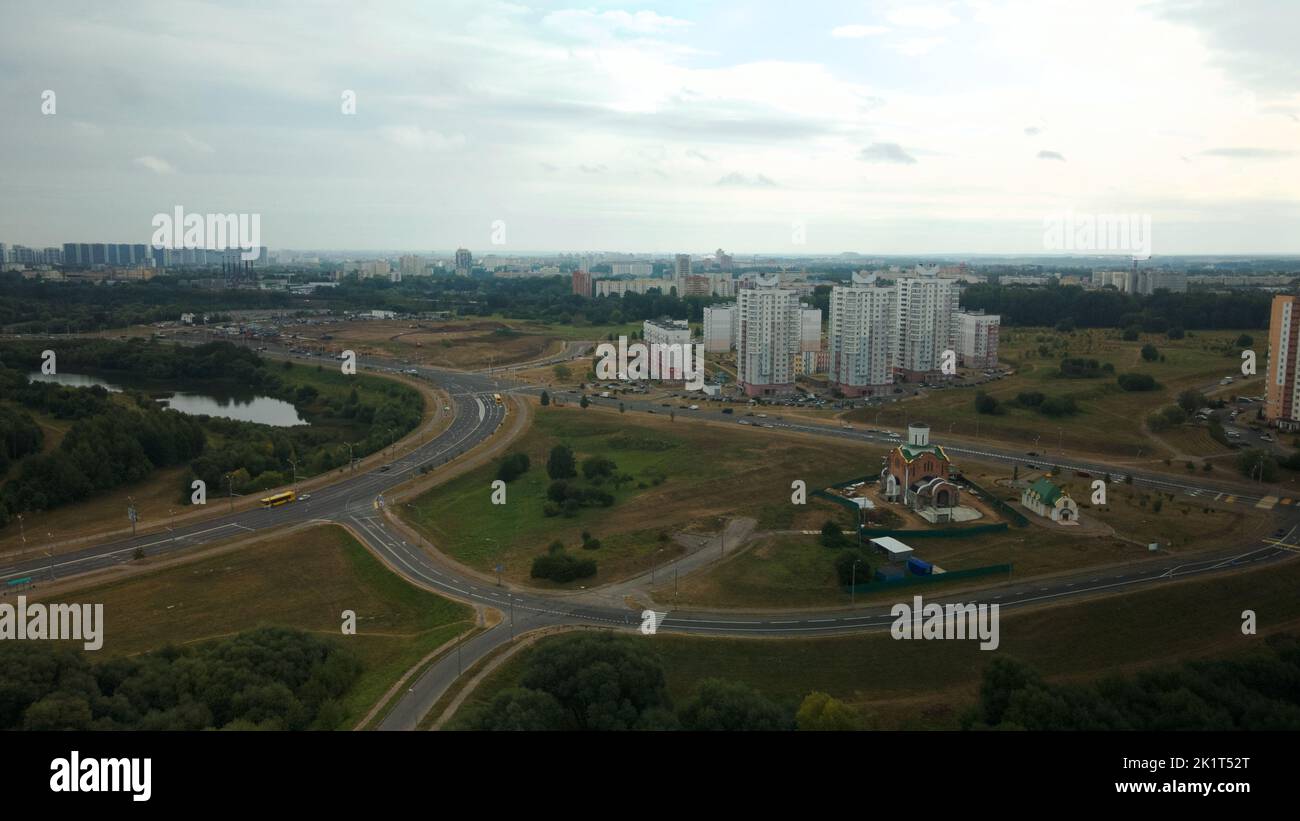 Dormitory area of a big city. Construction site of the church. Urban ...