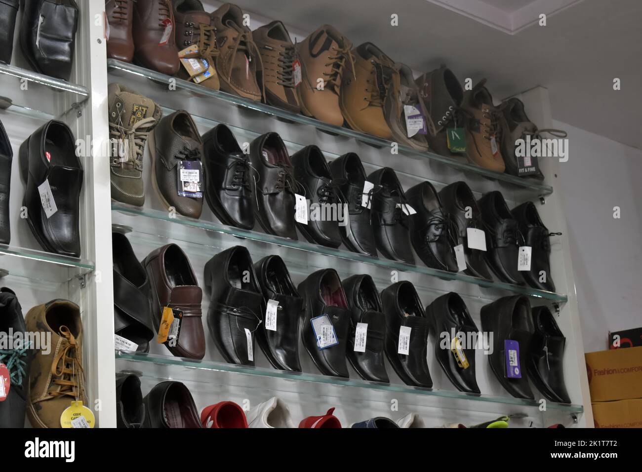 the retail display of formal shoes in various colors at the main market ...