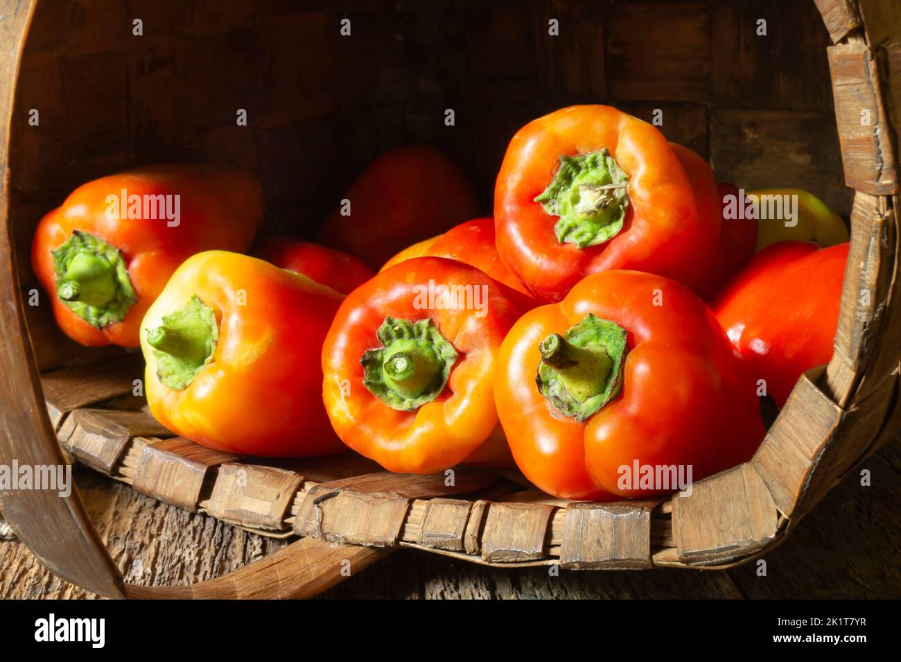 Bright vegetables on the background of old boards. Food is on the table ...